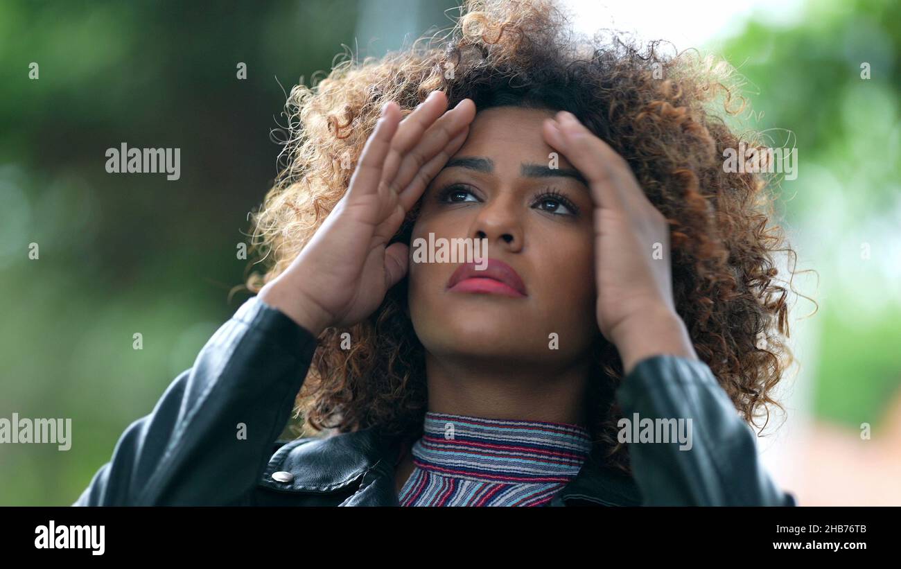 Worried black African woman suffering from emotional problems Stock ...