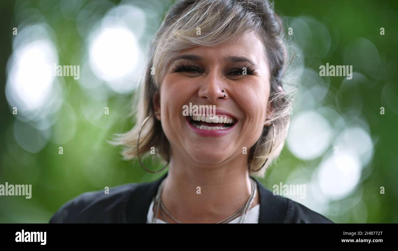 Young woman spontaneous laughter. Portrait person real life laugh and ...