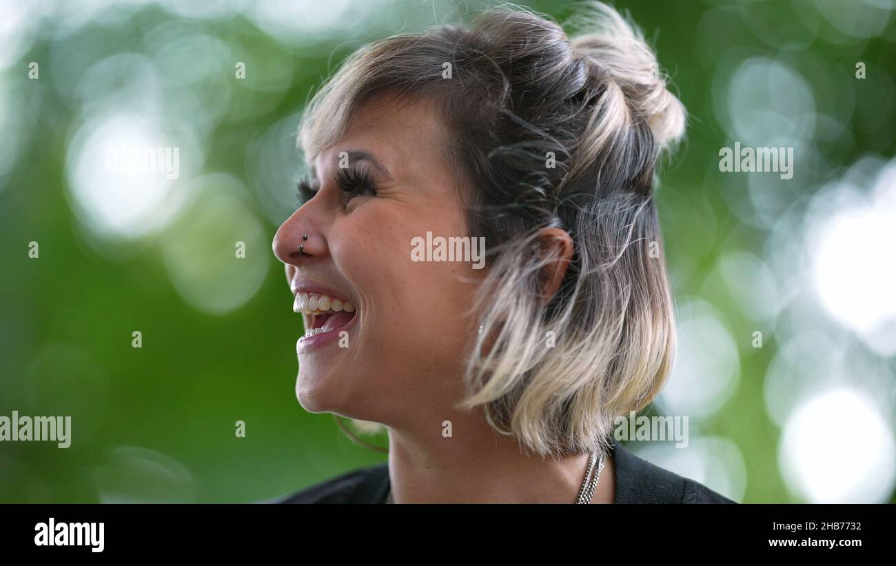 Young woman spontaneous laughter. Portrait person real life laugh and ...