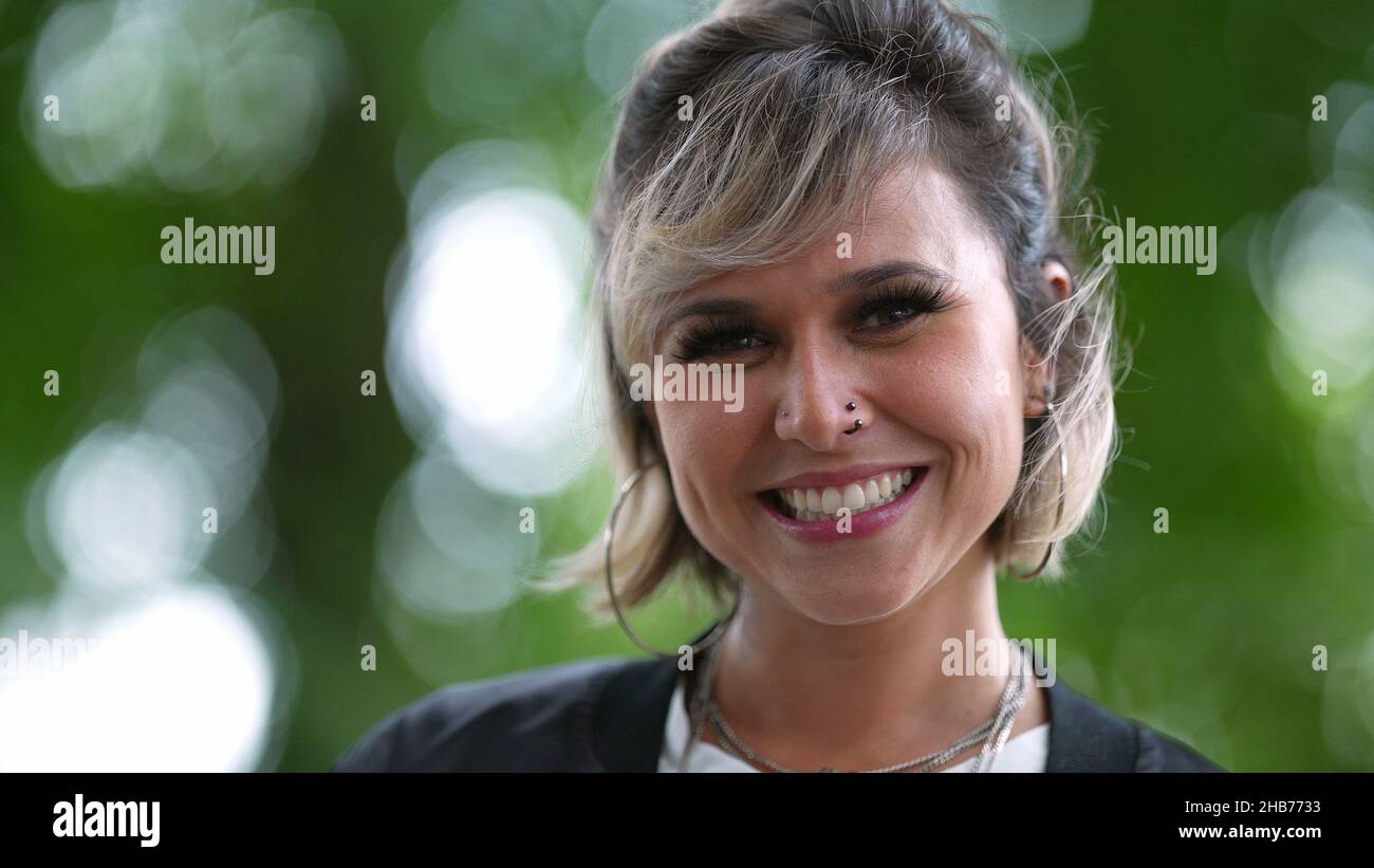 Young woman spontaneous laughter. Portrait person real life laugh and ...