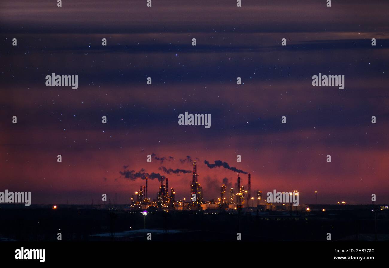 Smoke stack with smoke emission. Plant pipes pollute atmosphere ...