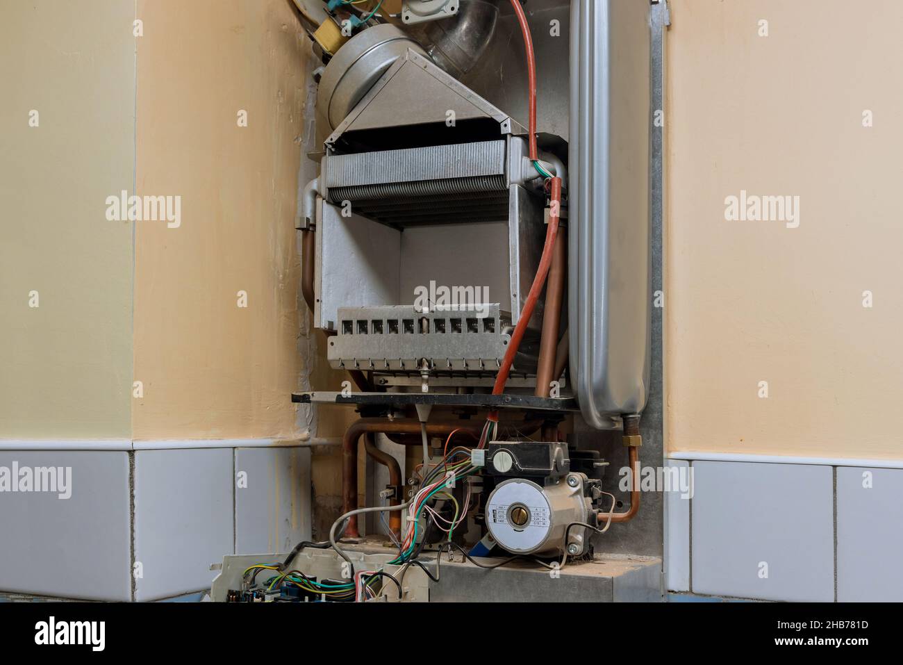 Setting up and servicing by heating systems installer Stock Photo - Alamy