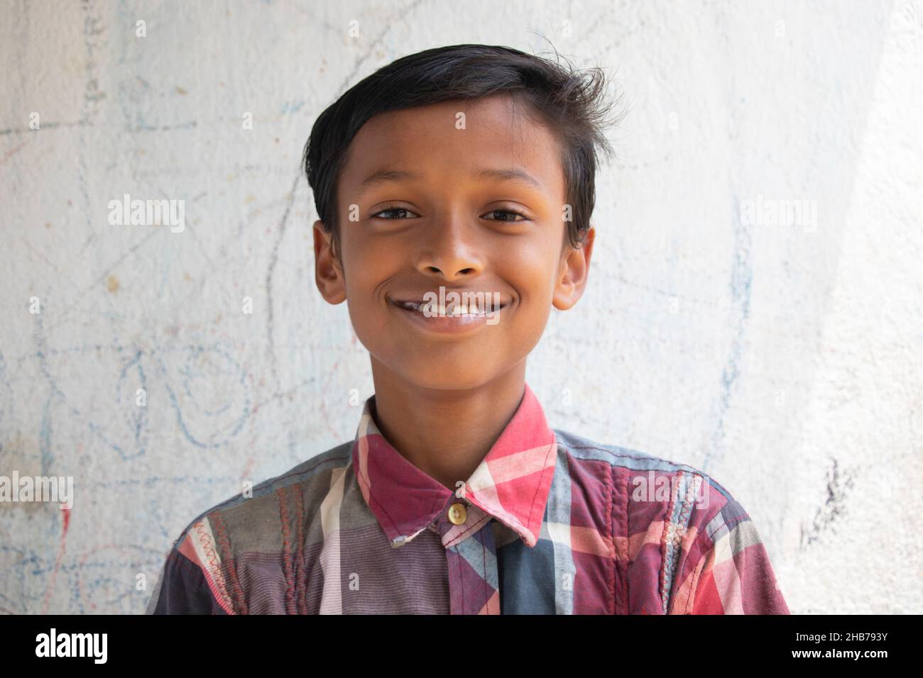 Portrait of a young rural boy smiling Stock Photo - Alamy
