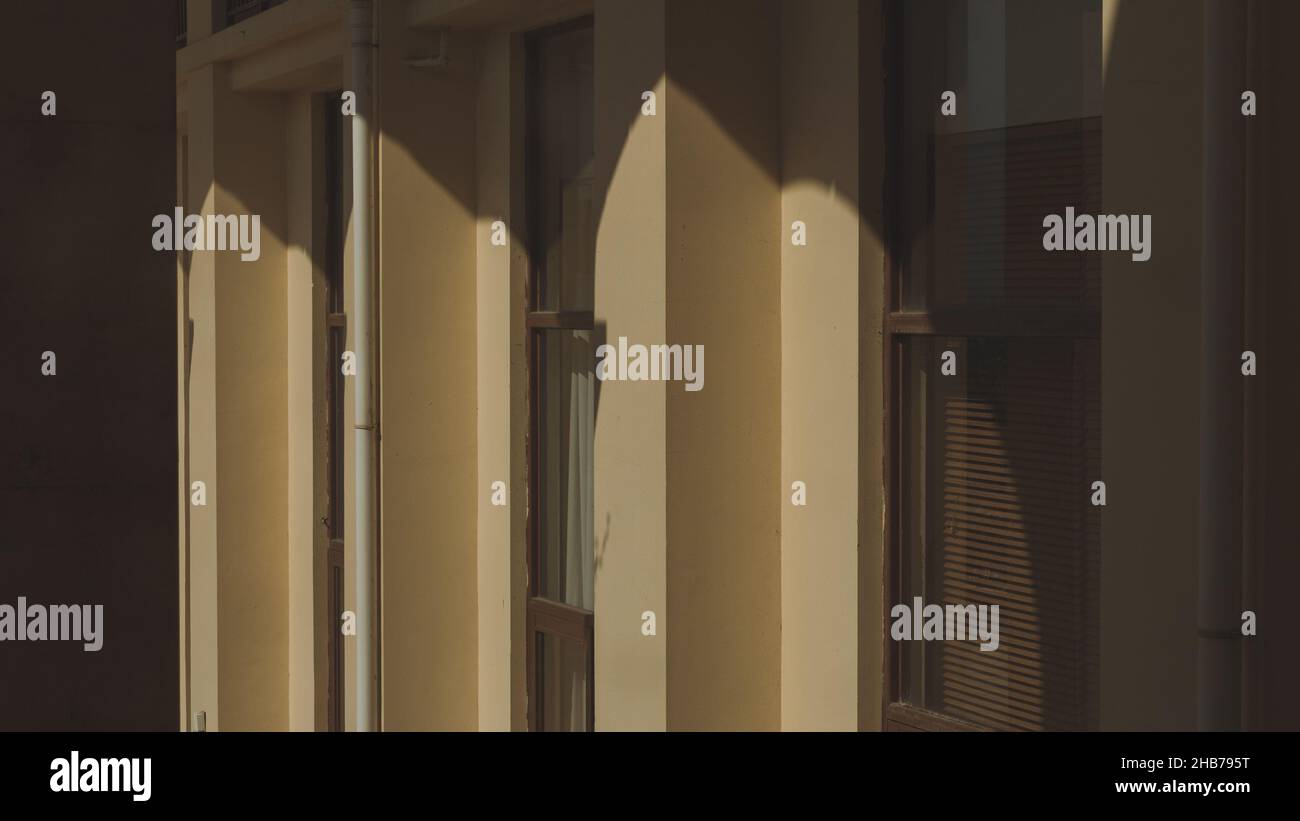 Closeup of the windows of a building during sunset, artsy aesthetic ...