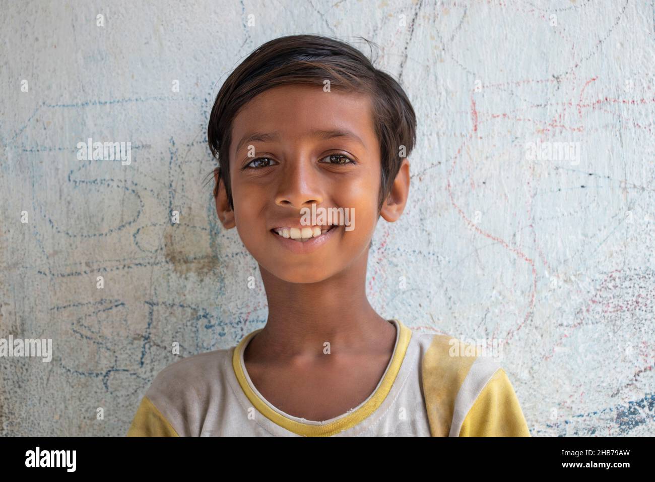 Portrait of a young rural boy smiling Stock Photo - Alamy