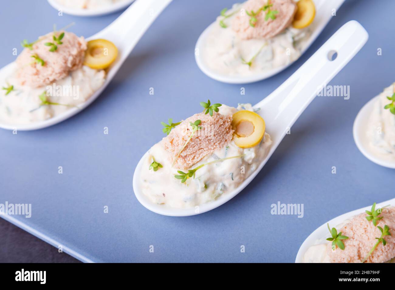 Cold appetizer made from cod liver, cod caviar, olives, cucumber and ...