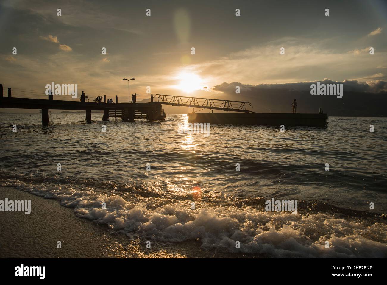 Sunset, jetty silhouette on brazil beach Stock Photo - Alamy