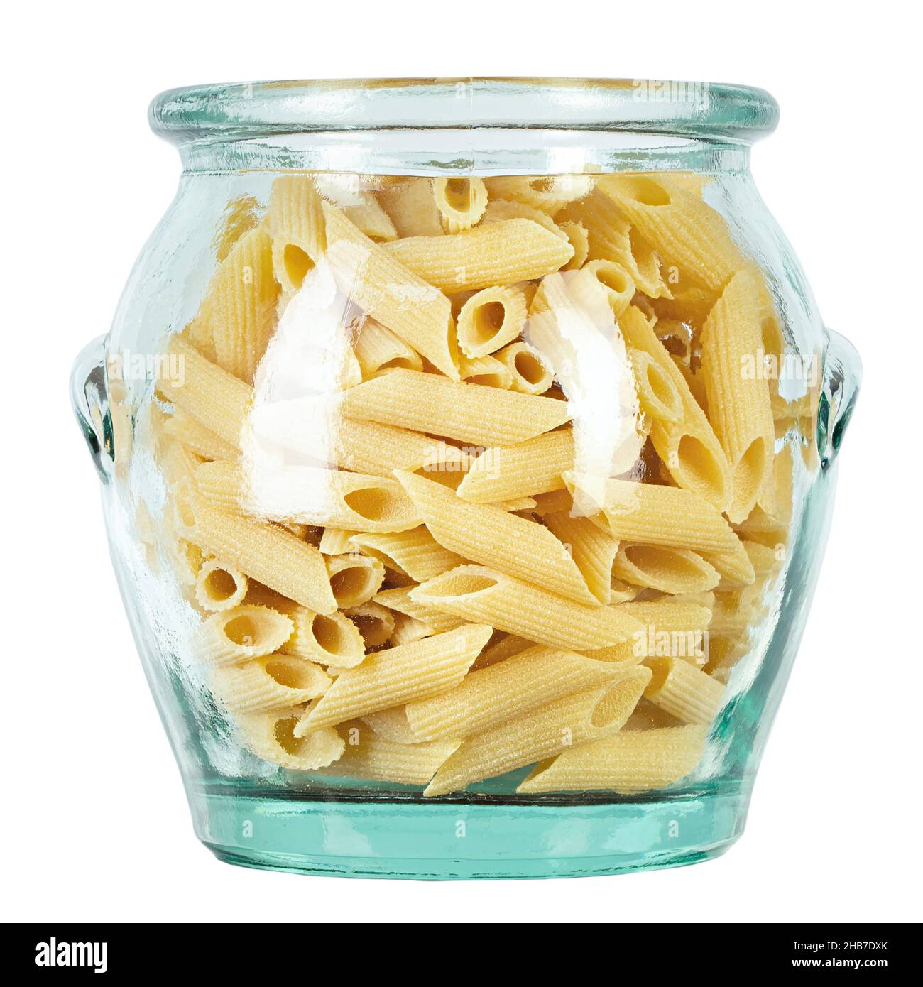 Pennette rigate. Raw pasta in a glass jar for storing bulk products ...