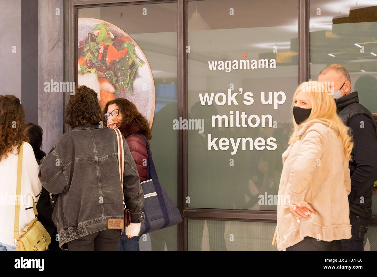 diners queue outside Wagamama restaurant in Milton Keynes England Stock ...