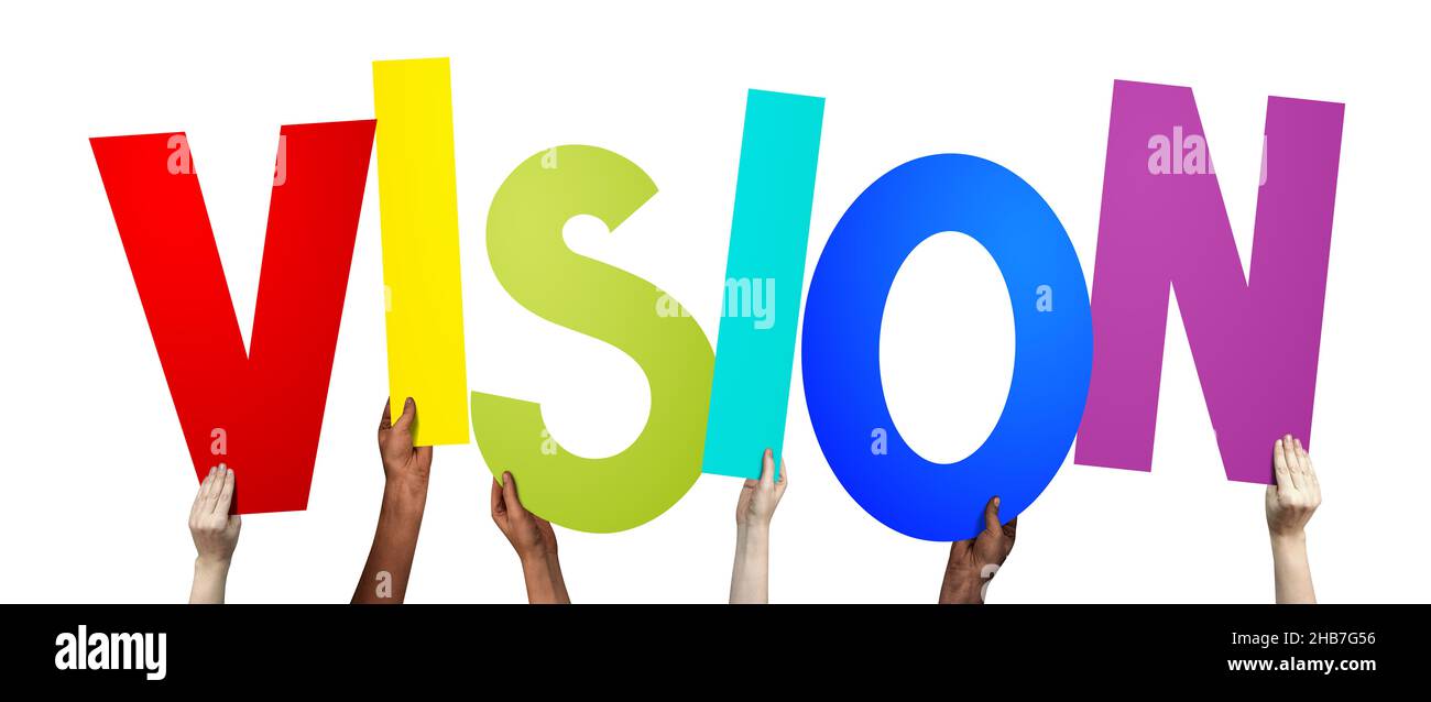 Vision - human hands holding colorful letter Stock Photo - Alamy