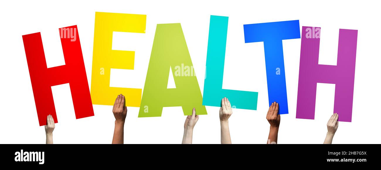 Health - human hands holding colorful letters Stock Photo - Alamy