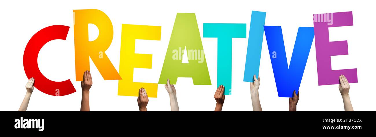 Creative - human hands holding colorful letters Stock Photo - Alamy