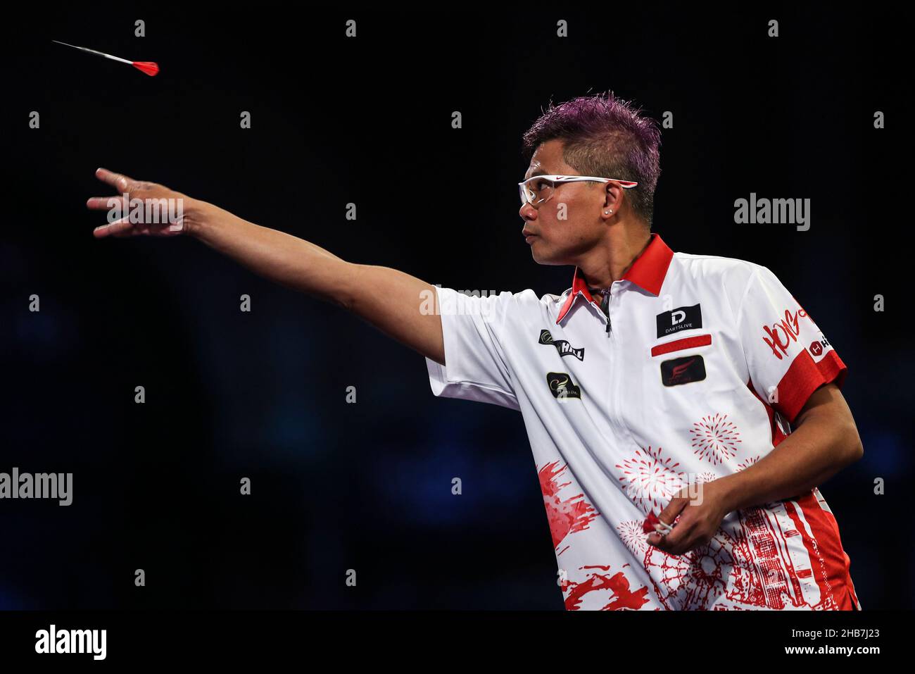 Royden Lam in action during day three of the William Hill World Darts ...