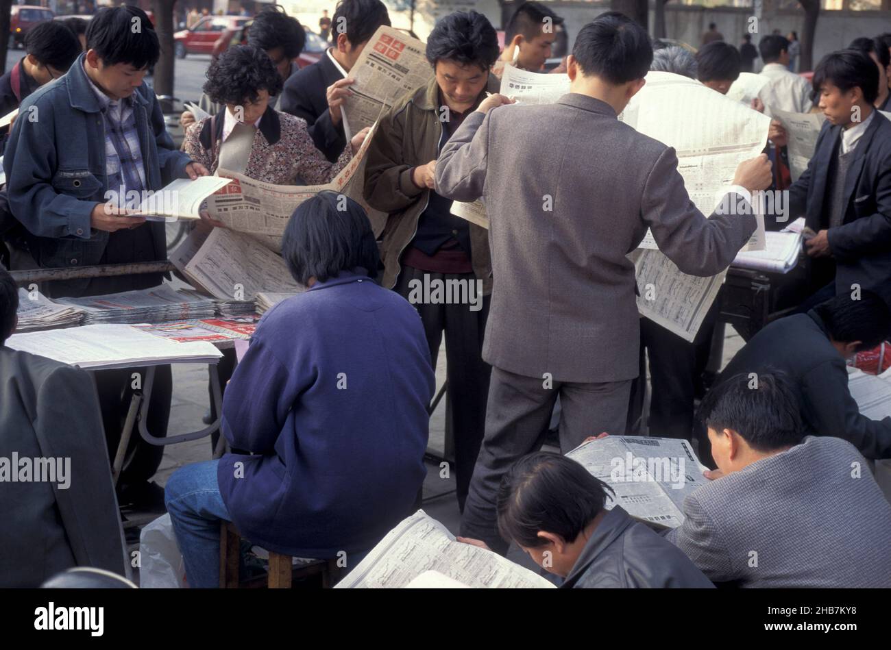 Chinese People read Newspaper in the Old City of Xian in the Provinz of ...