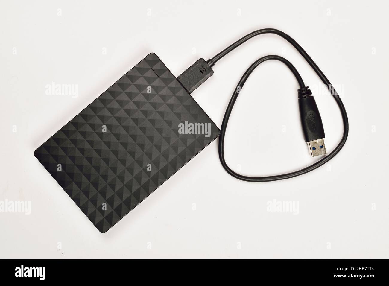 External Hard Disk with Cable on White Background Stock Photo - Alamy