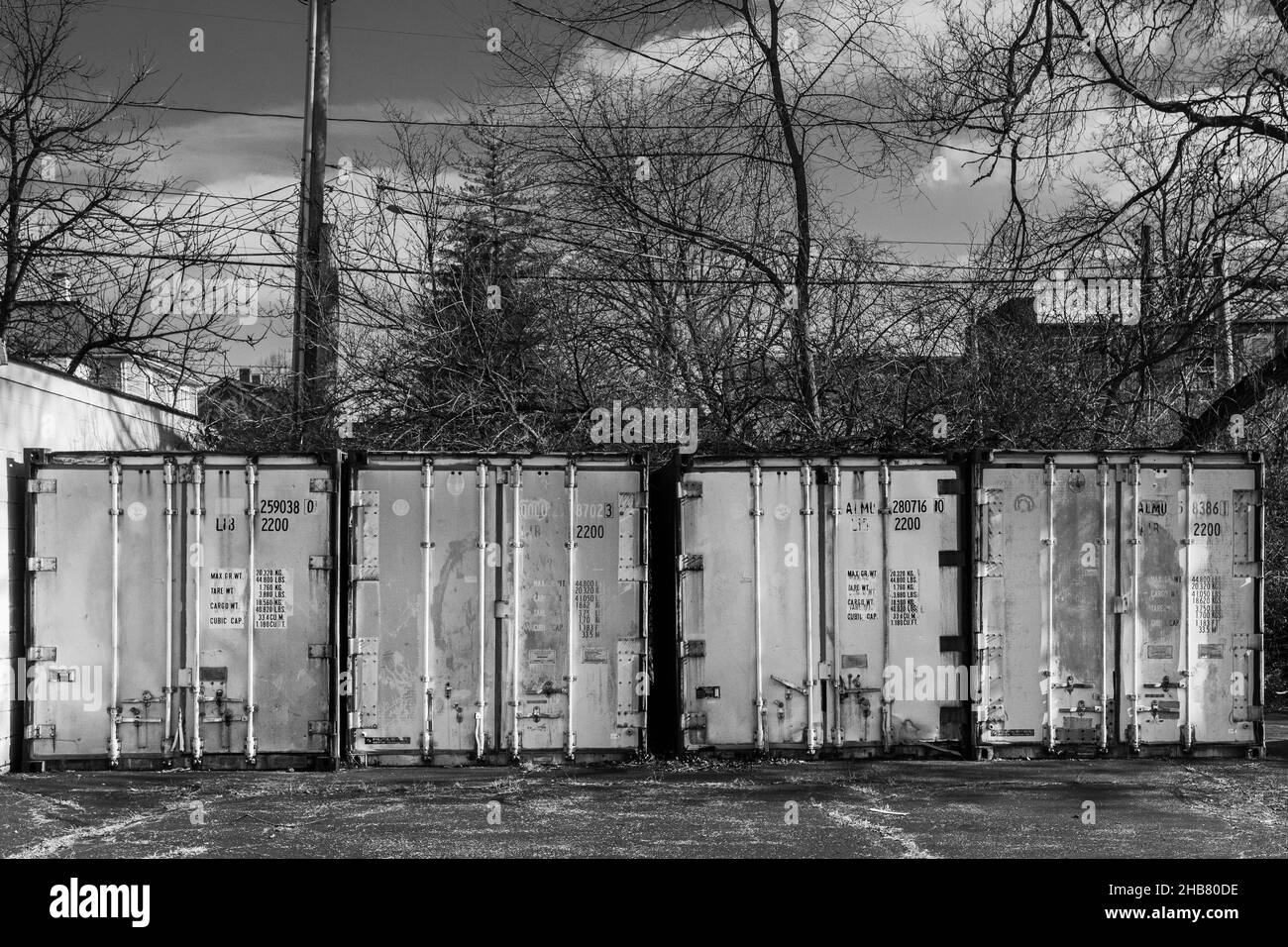 Old metal containers Black and White Stock Photos & Images - Alamy