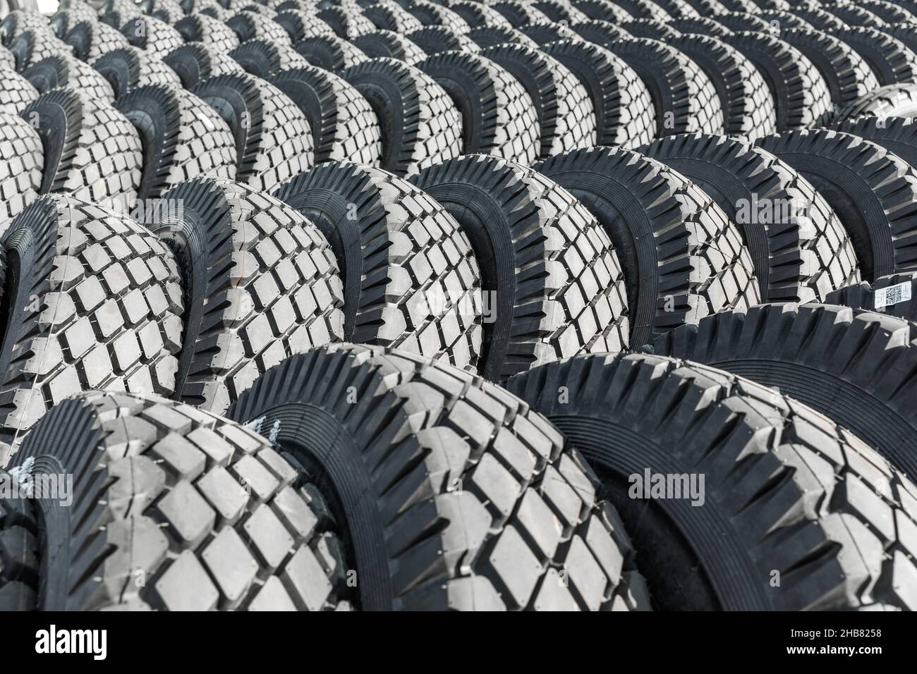 Photo of black big tires on wheels for large cars Stock Photo - Alamy