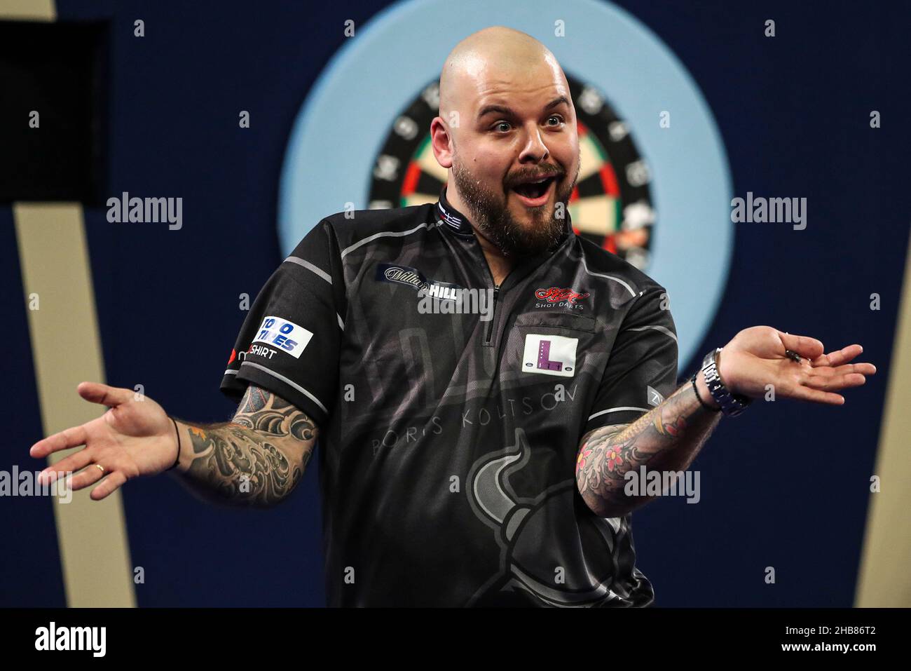 Boris Koltsov celebrates after winning his match against Jermaine ...