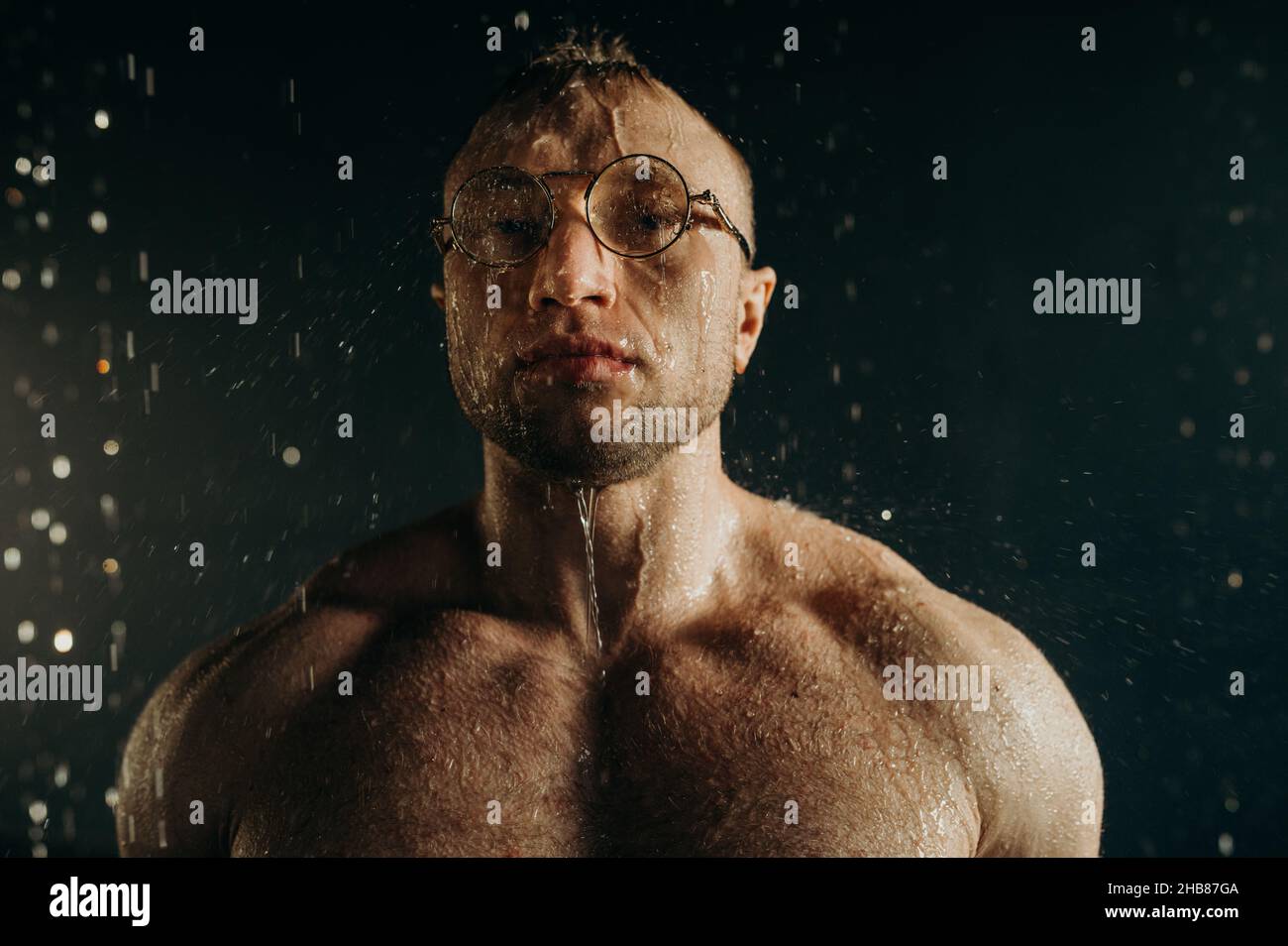 Muscular men in shower hi-res stock photography and images - Alamy