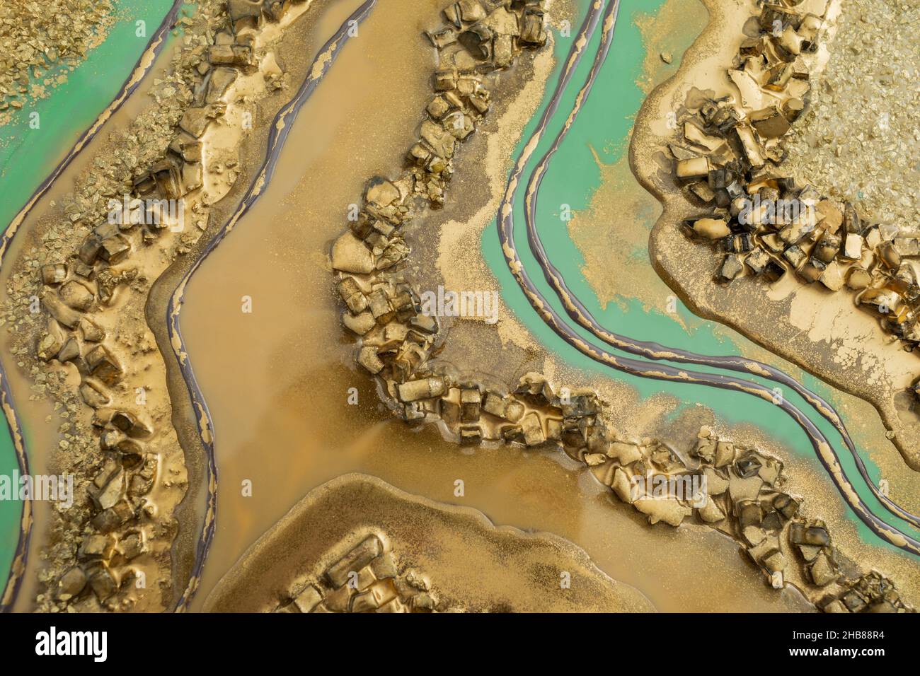 Resin art texture with golden colors and glass Stock Photo - Alamy