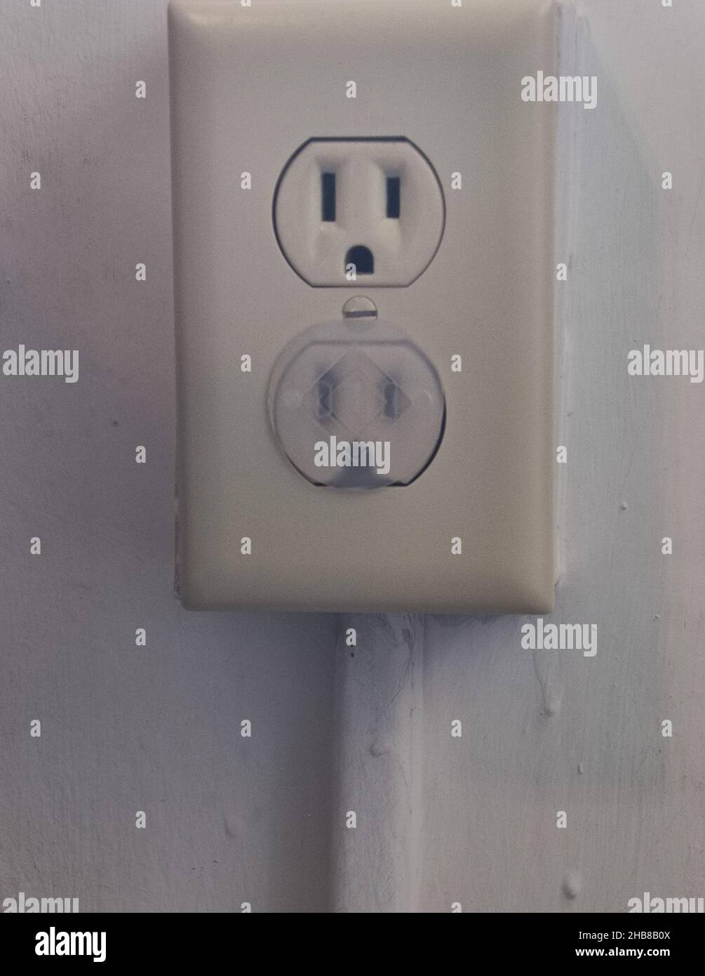 Safety socket cover hi-res stock photography and images - Alamy