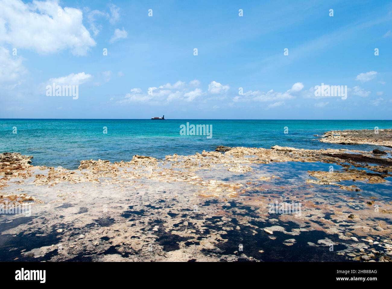 The view of rocky Seven Mile Beach in George Town on Grand Cayman ...