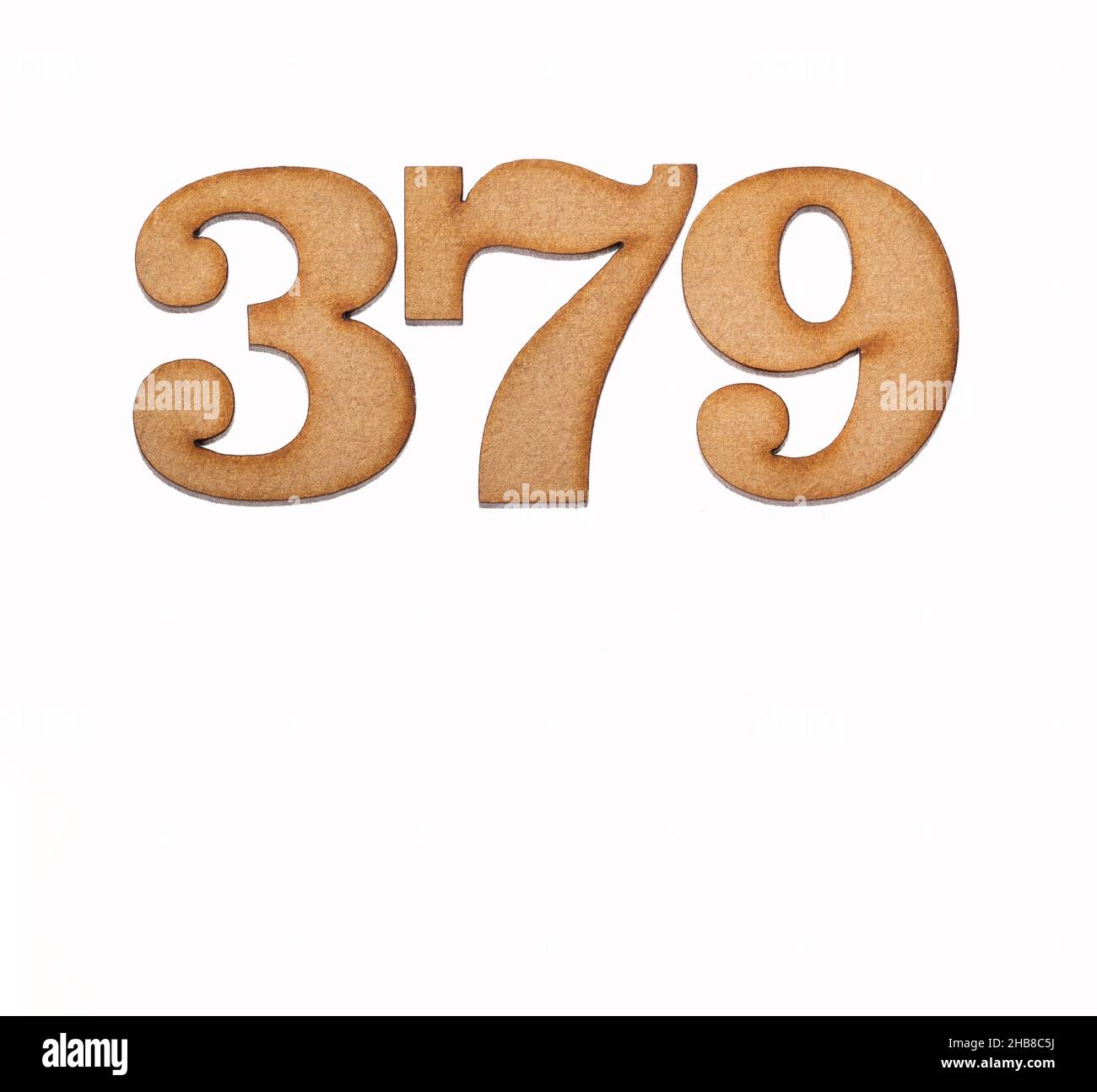 Number 379 - Piece of wood isolated on white background Stock Photo - Alamy