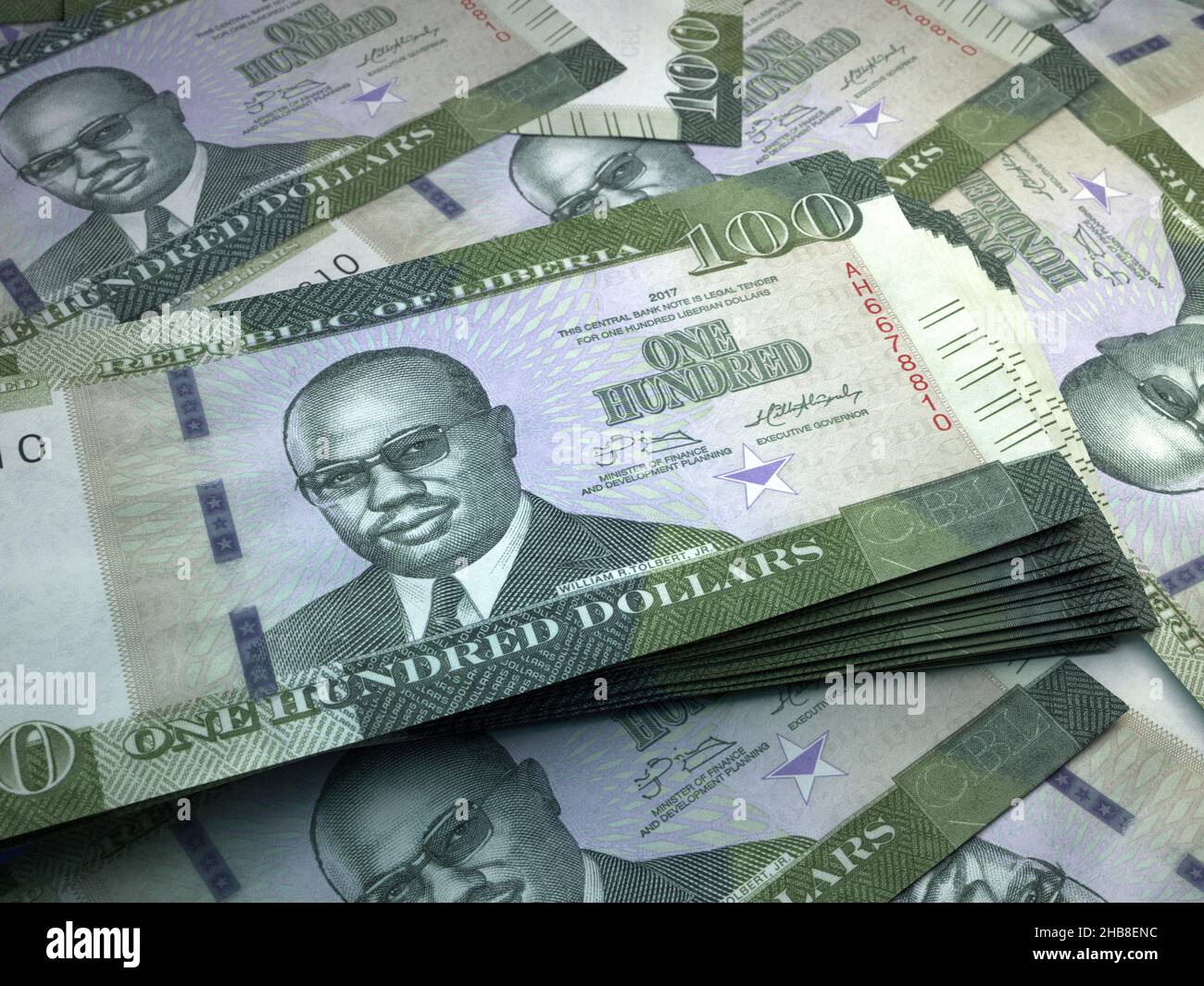 Money of Liberia. Dollar bills. LRD banknotes. 100 English. Business ...