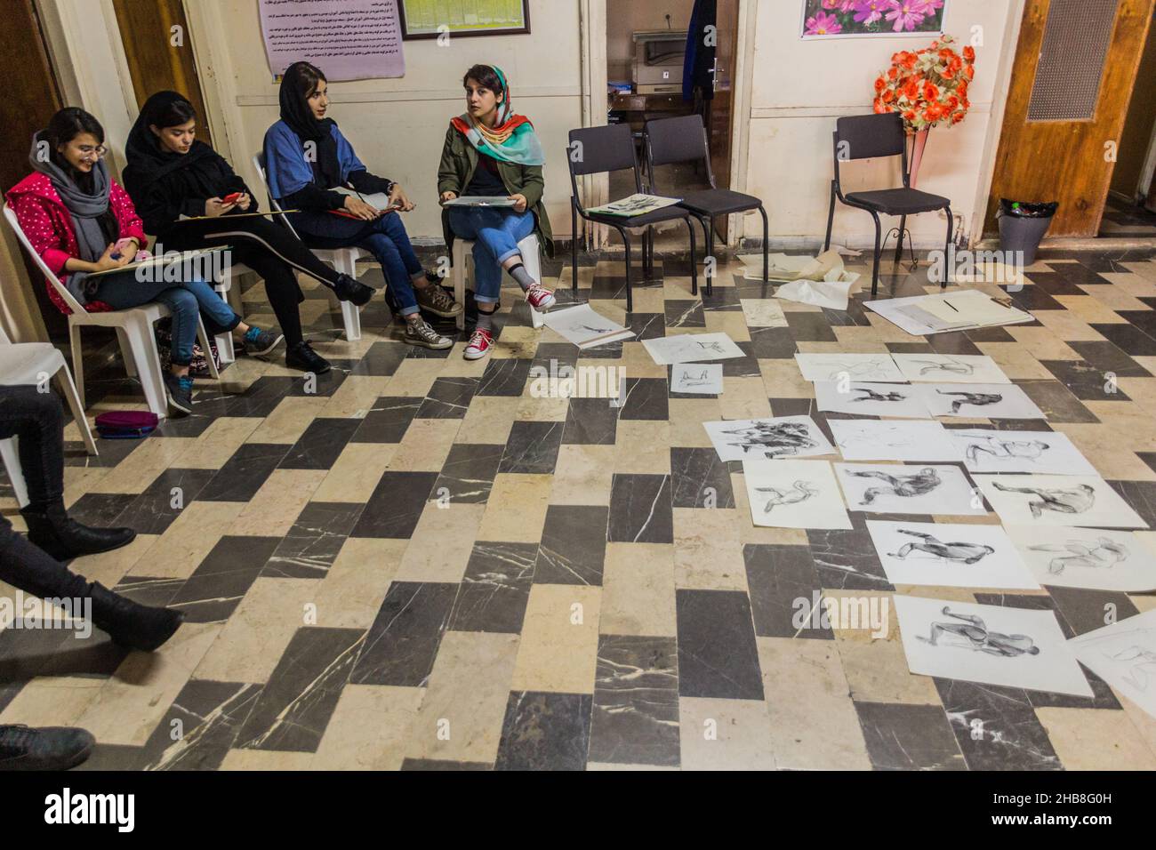 ARDABIL, IRAN - APRIL 11, 2018: Local young people attending a drawing ...