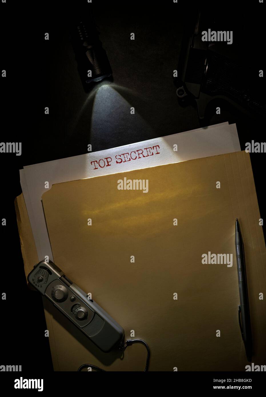 Overhead view of top secret documents on desk top Stock Photo - Alamy