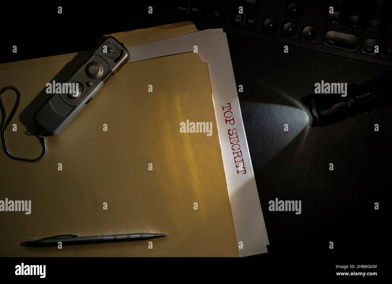 Overhead view of top secret documents on desk top Stock Photo - Alamy