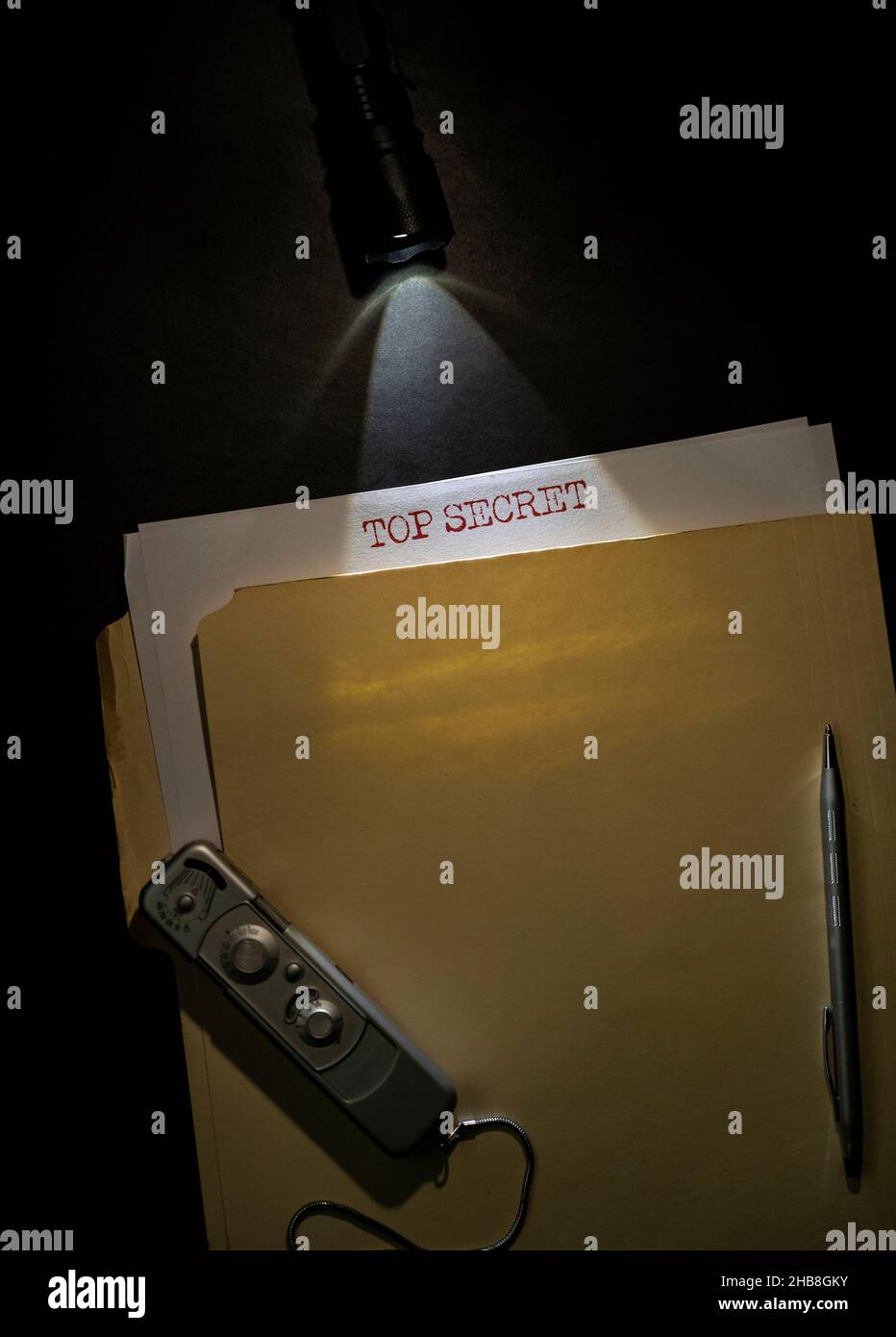 Overhead view of top secret documents on desk top Stock Photo - Alamy