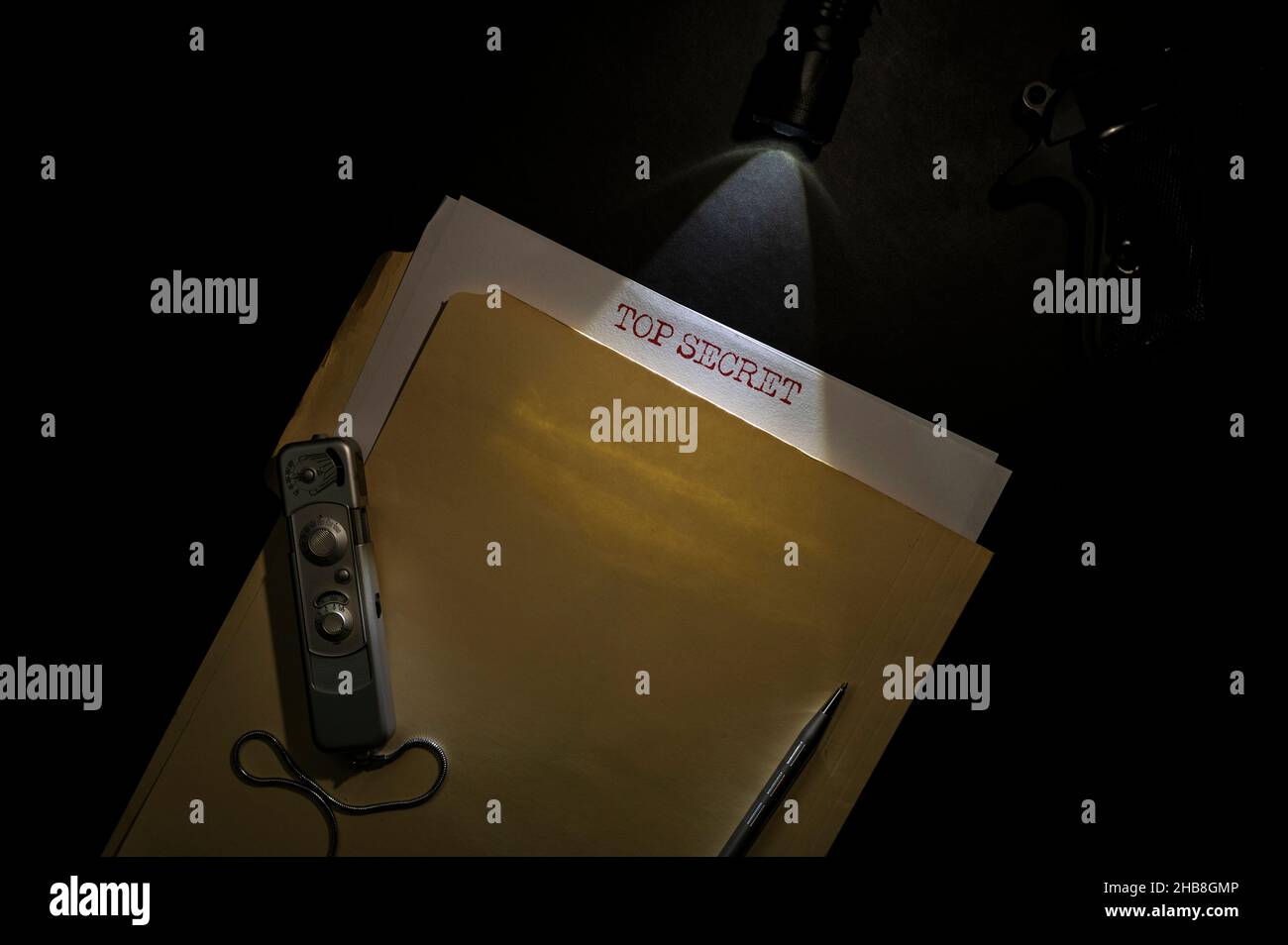 Overhead view of top secret documents on desk top Stock Photo - Alamy