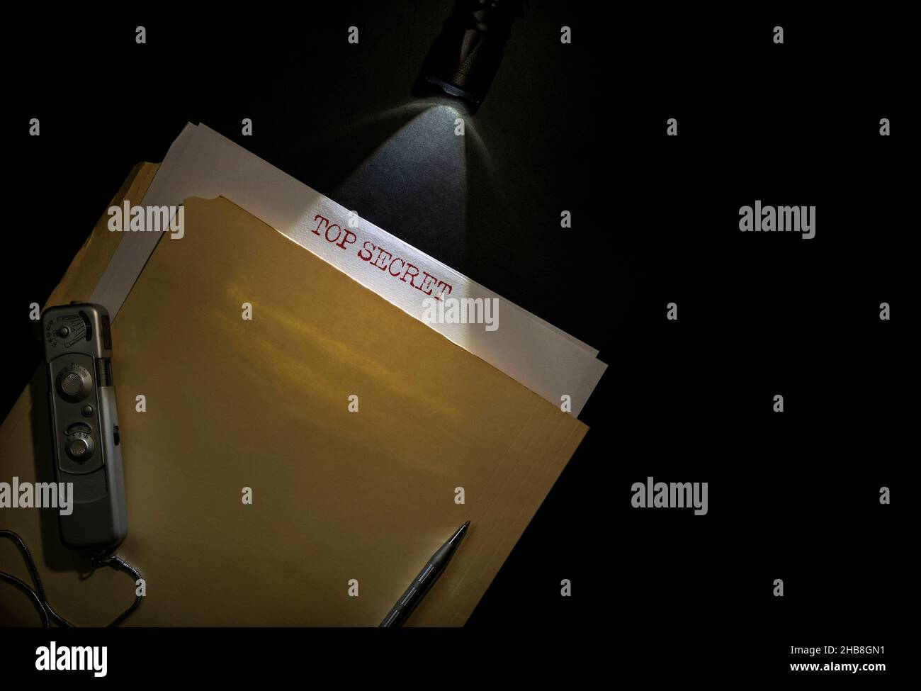 Overhead view of top secret documents on desk top Stock Photo - Alamy