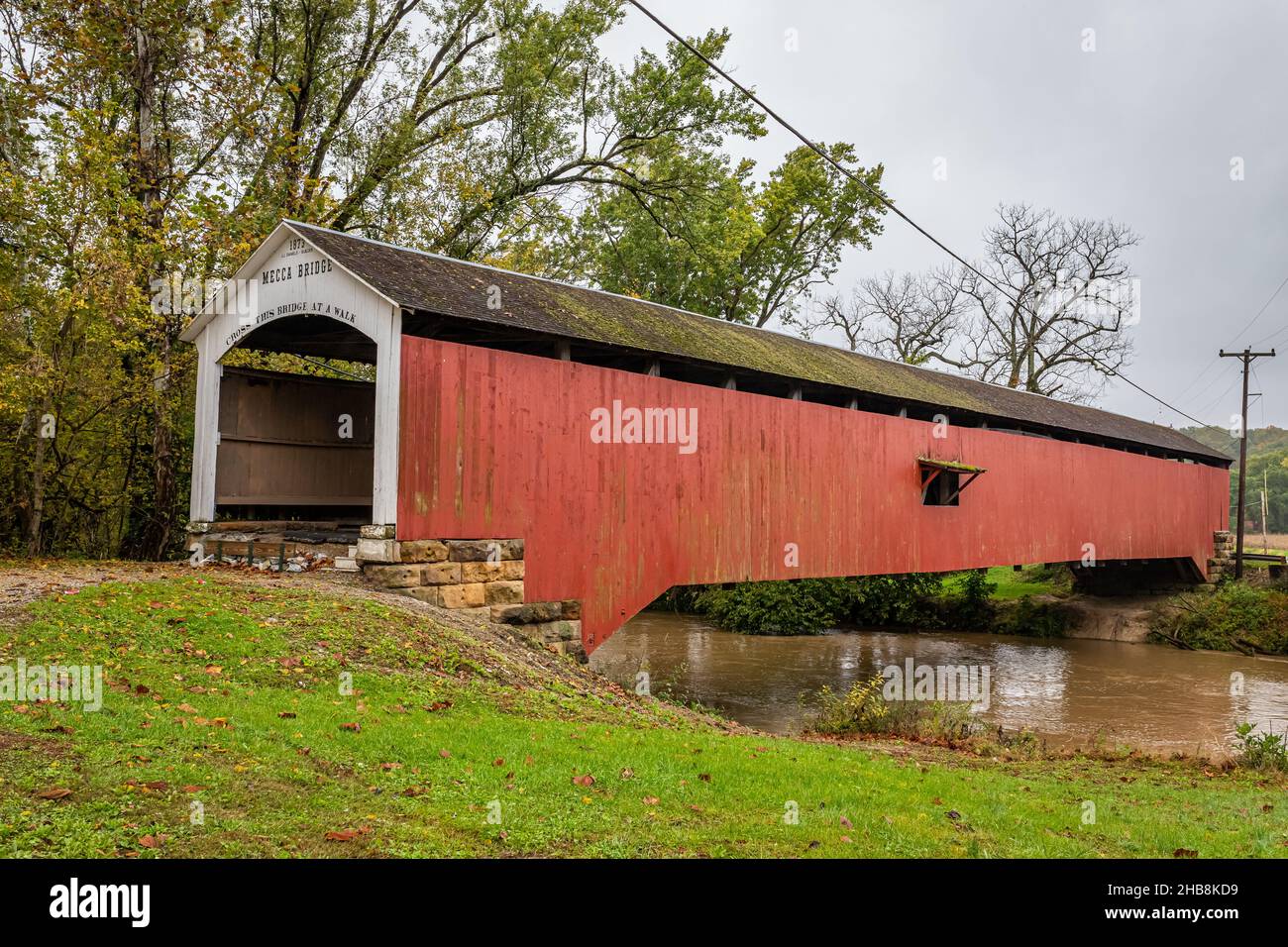 The Mecca Covered Bridge crosses Big Raccoon Creek during Autumn leaf ...
