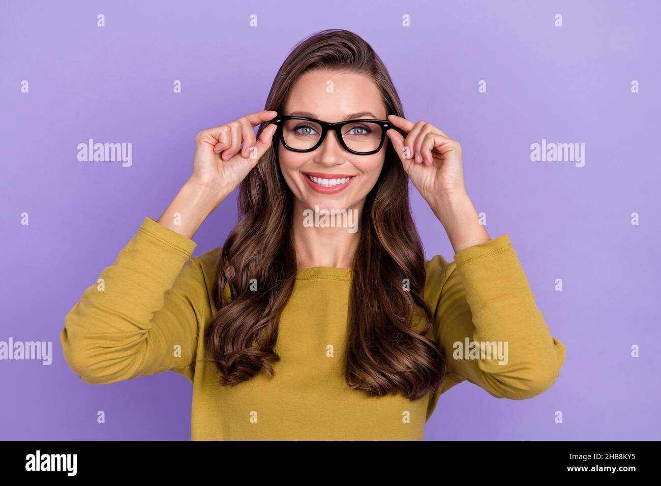 Photo of positive pretty person hands touch glasses look camera ...
