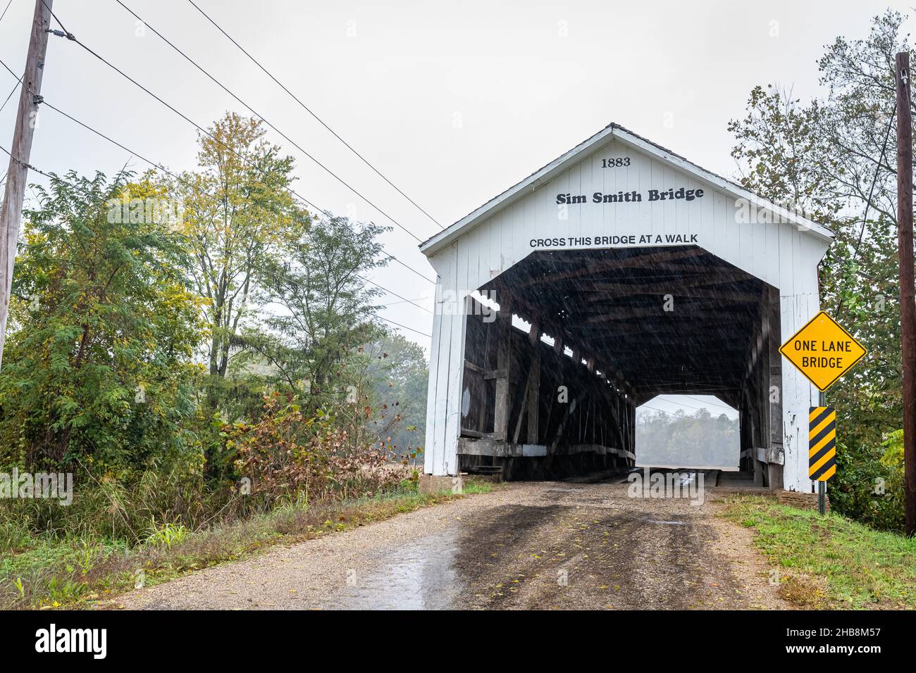 The Sim Smith Covered Bridge crosses Big Raccoon Creek during Autumn ...