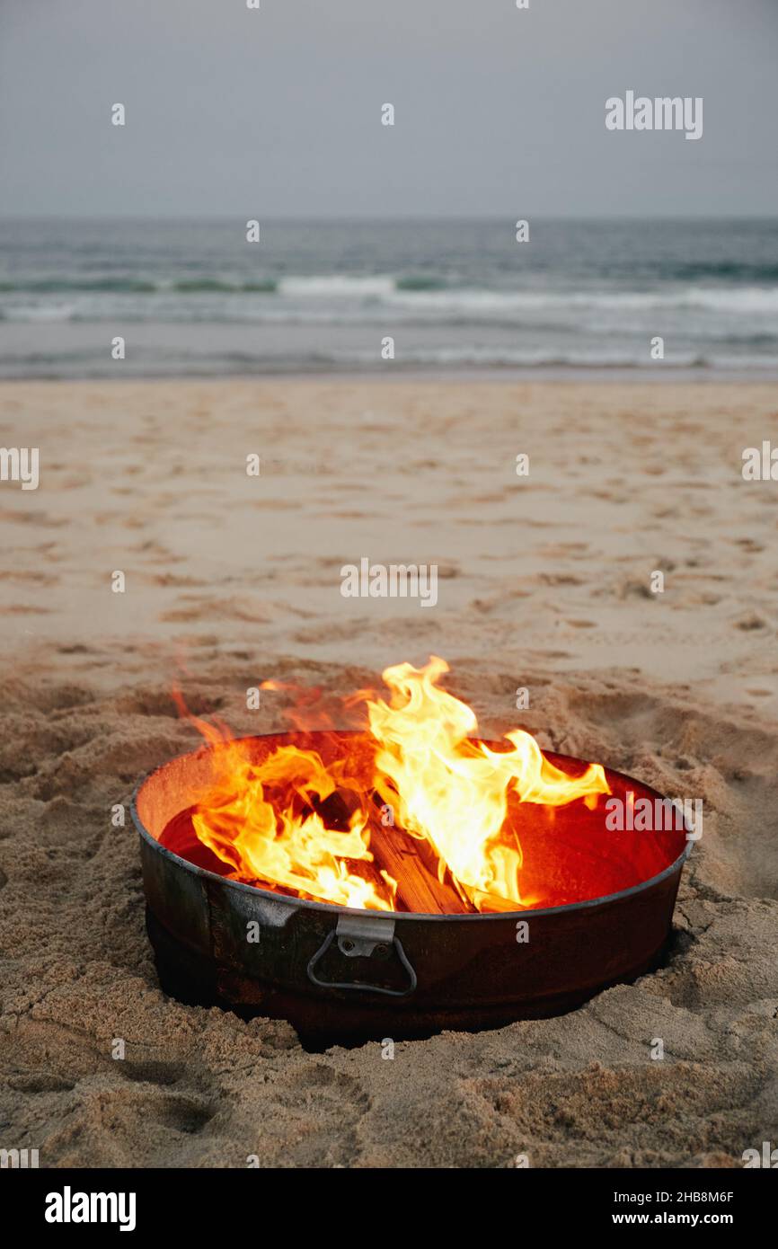 Bonfire at beach Stock Photo - Alamy