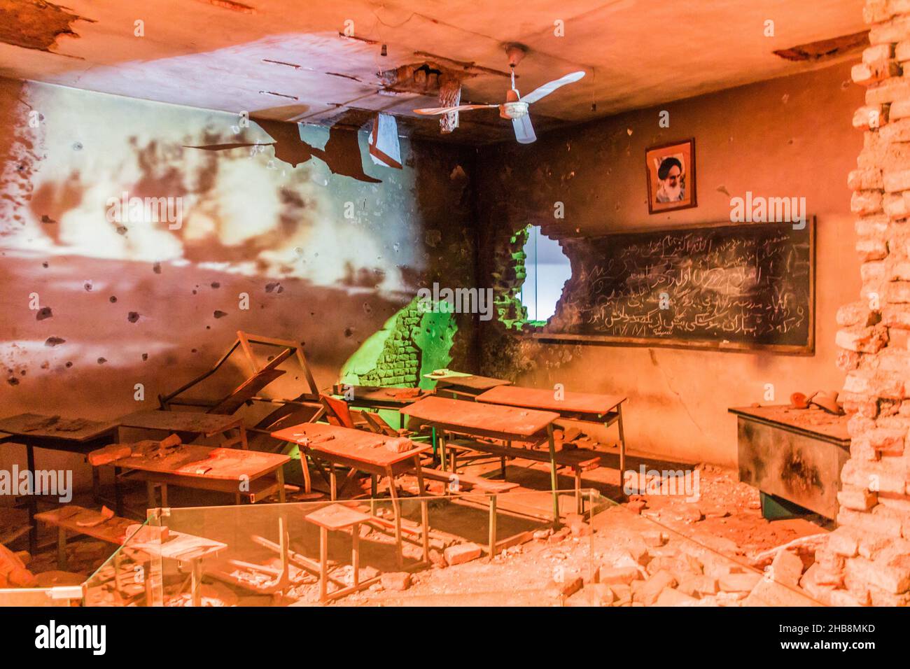 TEHRAN, IRAN - APRIL 16, 2018: Exhibit of a bombed classroom in the ...