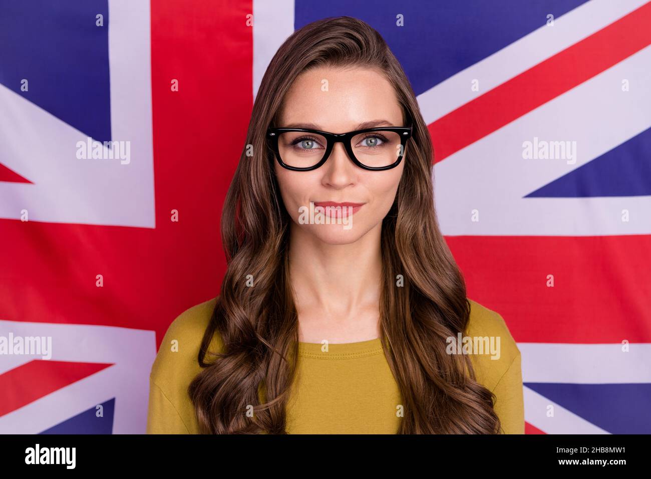 Photo of clever intelligent pretty lady look camera isolated on british ...