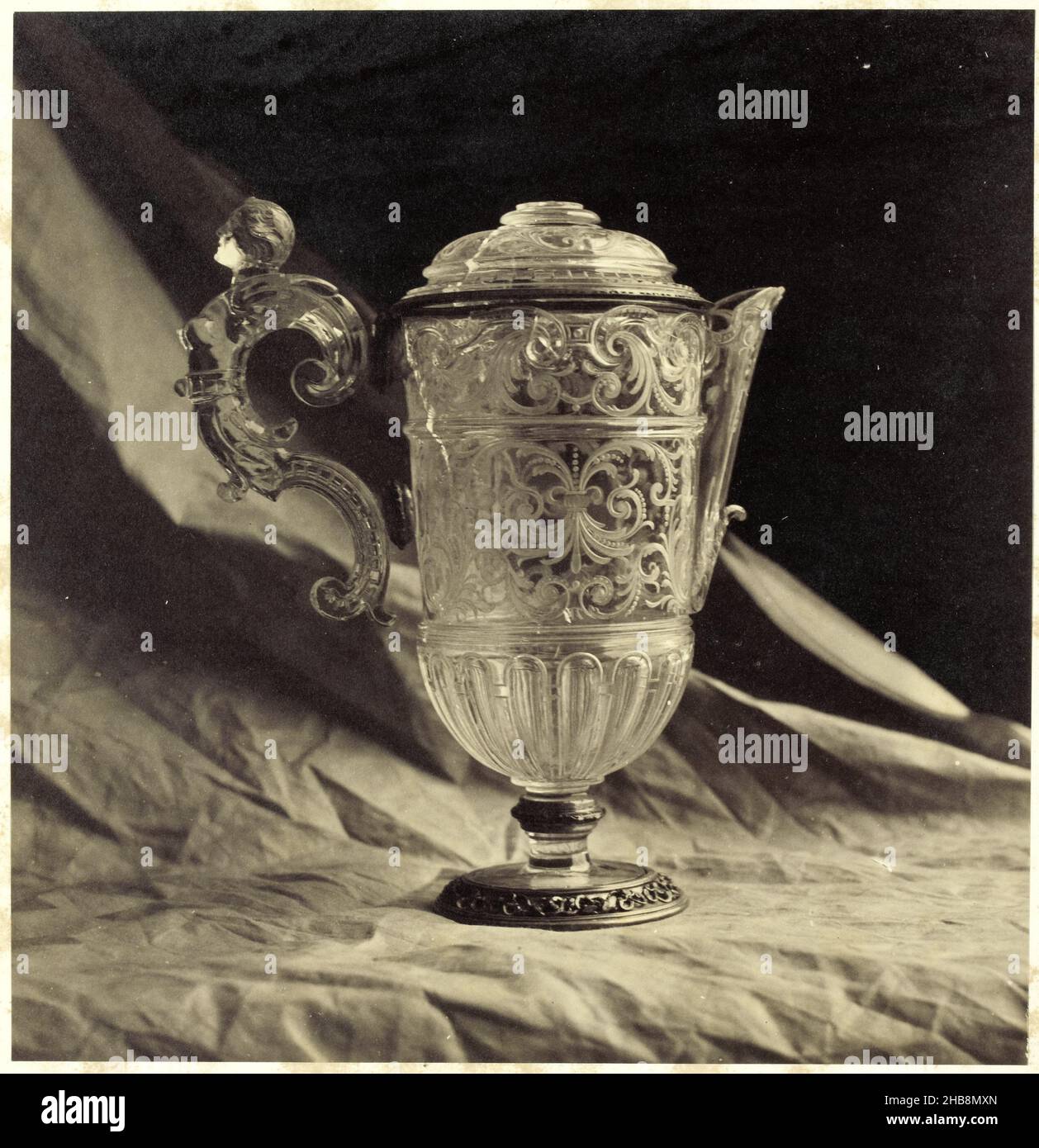 Crystal engraved pouring jug with female handle, from the Louvre ...
