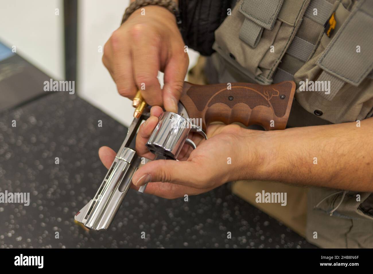 Soldier reloading revolver Stock Photo - Alamy