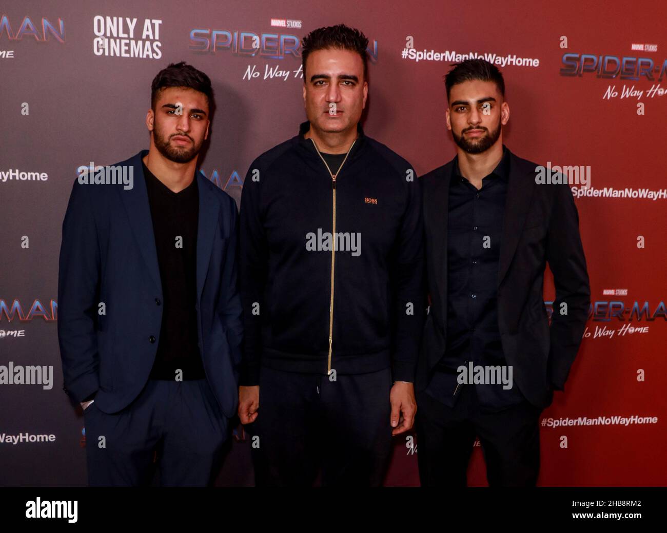 Adam Azim and Hassan Azim along with their father (C) seen attending ...