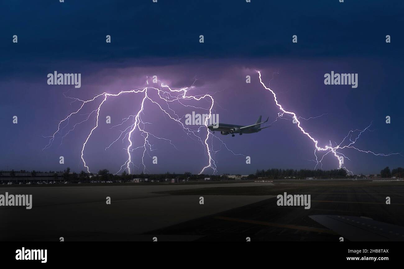 USA, Florida, Miami, Commercial jet landing in thunderstorm Stock Photo ...