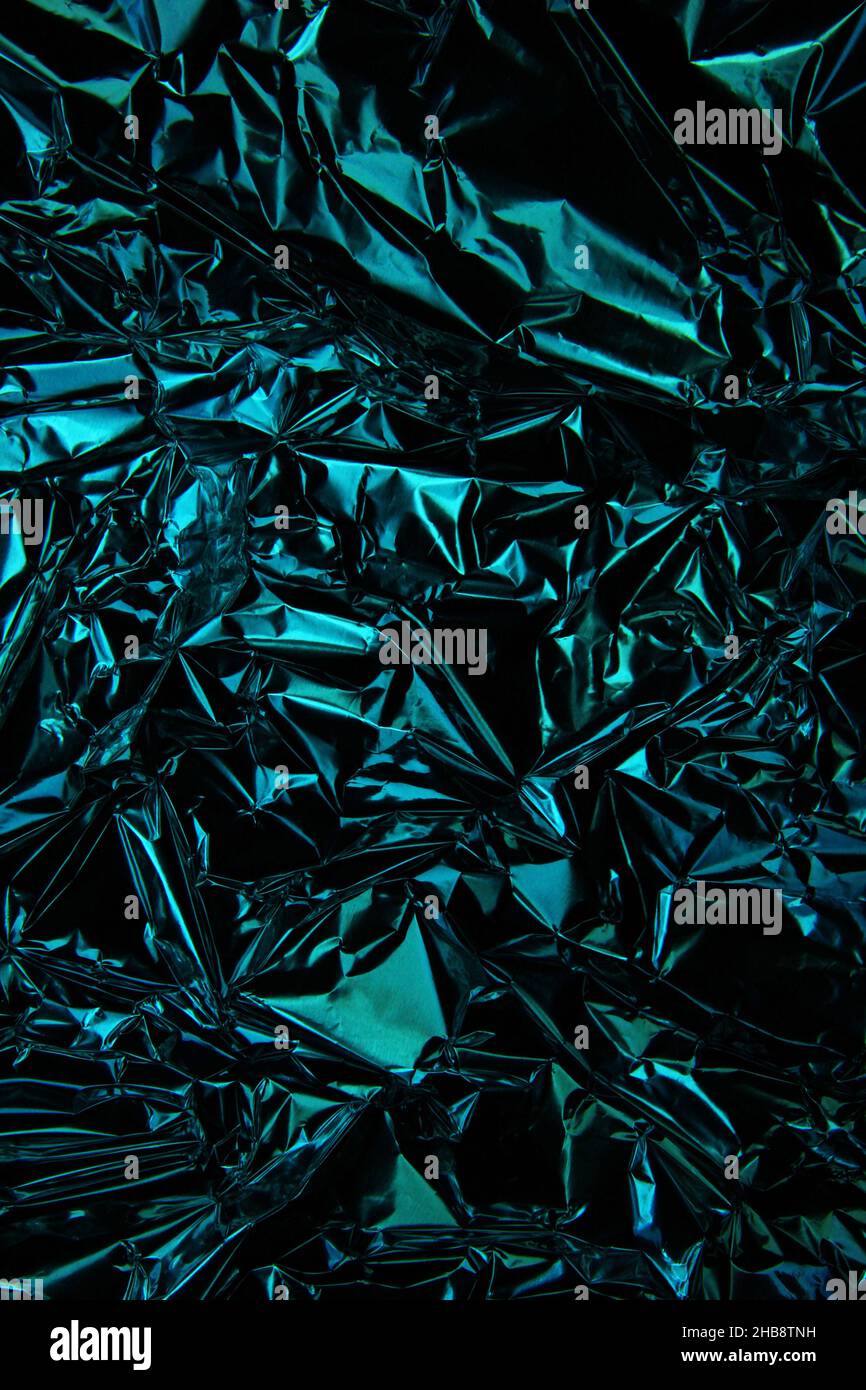 Foil background. Crumpled foil. Abstract background. Wallpaper. Blue ...