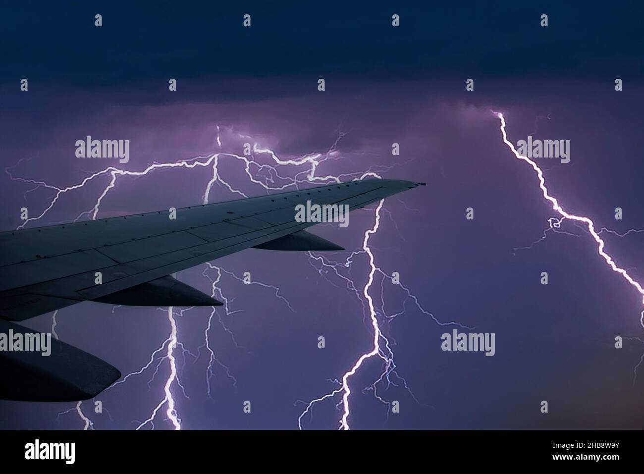 Thunderstorm and lightning seen from airplane Stock Photo - Alamy