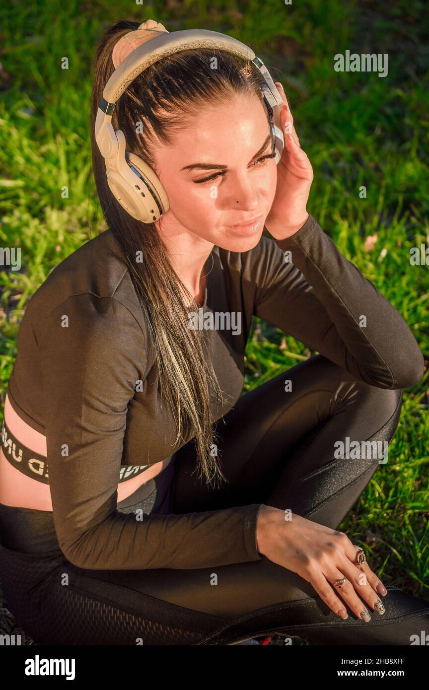 Girl - music lover with headphones listening to music Stock Photo - Alamy