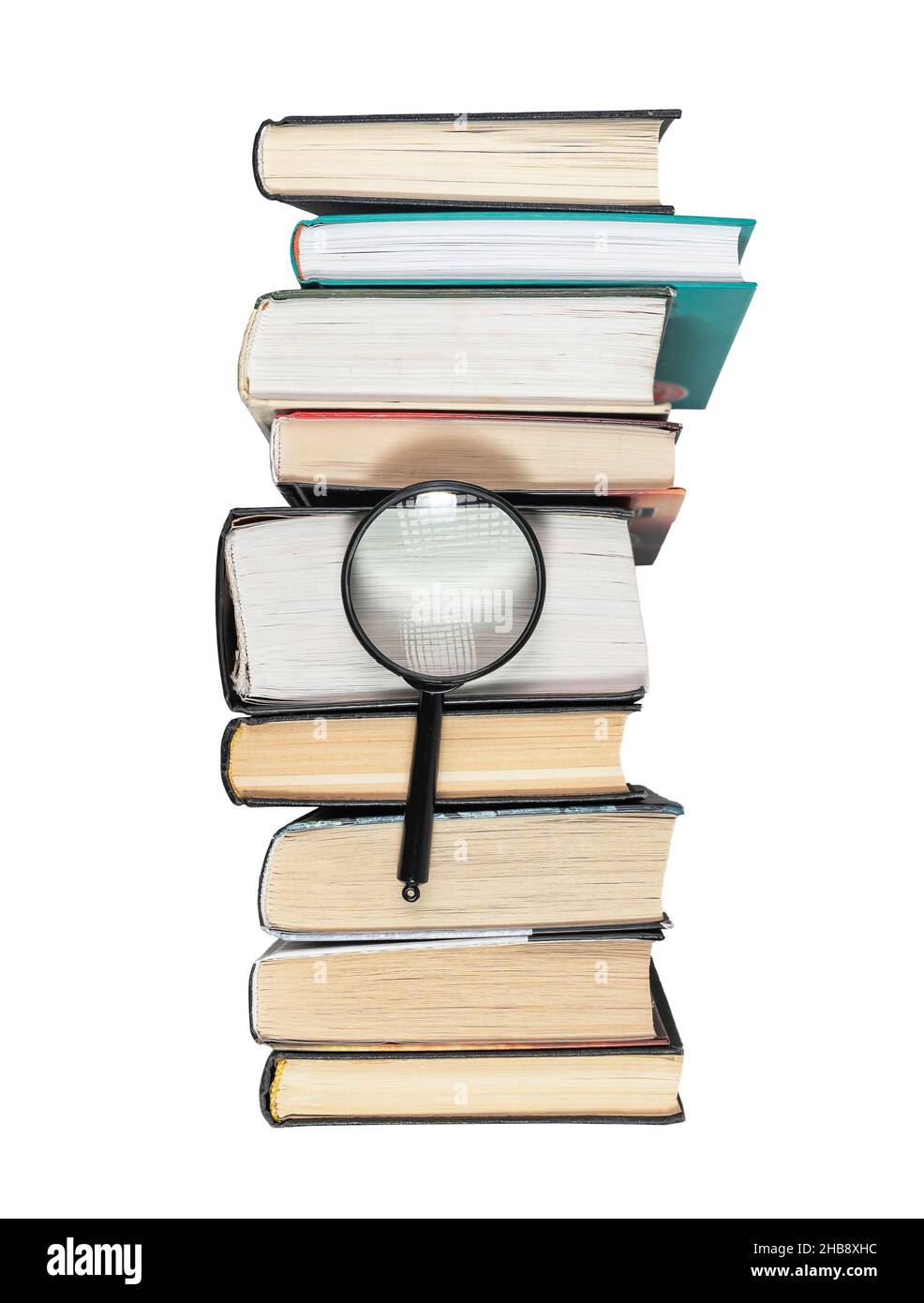 Magnifying lens over books stack isolated on white background. Concept ...