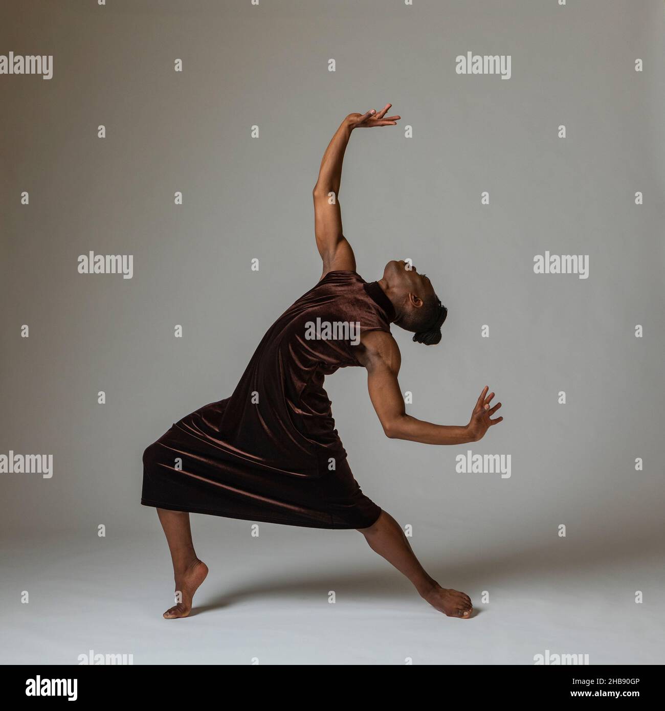 Studio shot of man dancing Stock Photo - Alamy