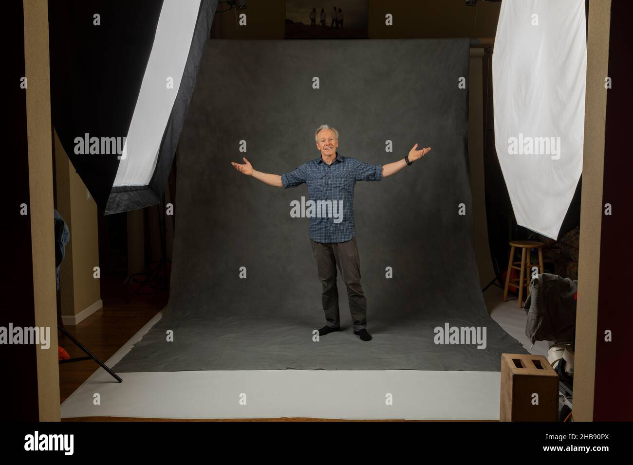 Photographer on photo studio set Stock Photo - Alamy
